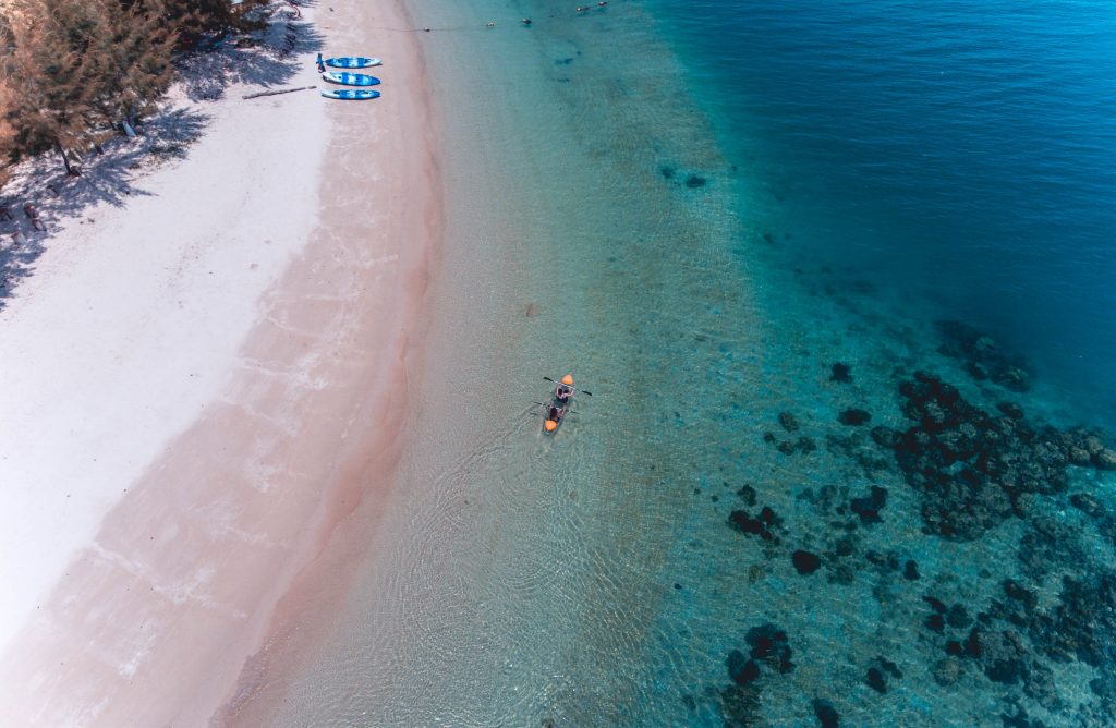9 - Top Drone View of Island and Clear Kayak | Ara Dinawan Island